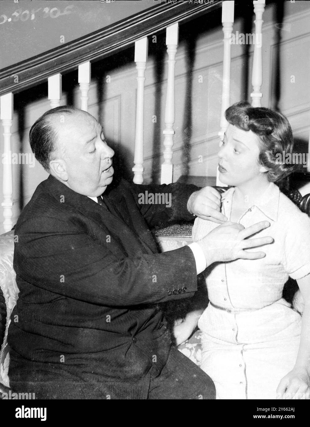 Alfred Hitchcock with his daughter Patricia while she is being made up ...