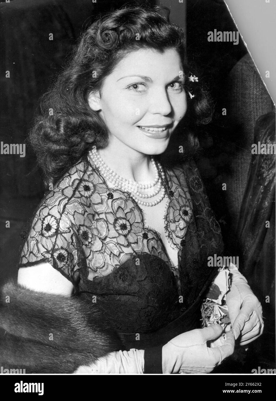 French Actress, Simone Silva, wearing a black evening gown with a black ...