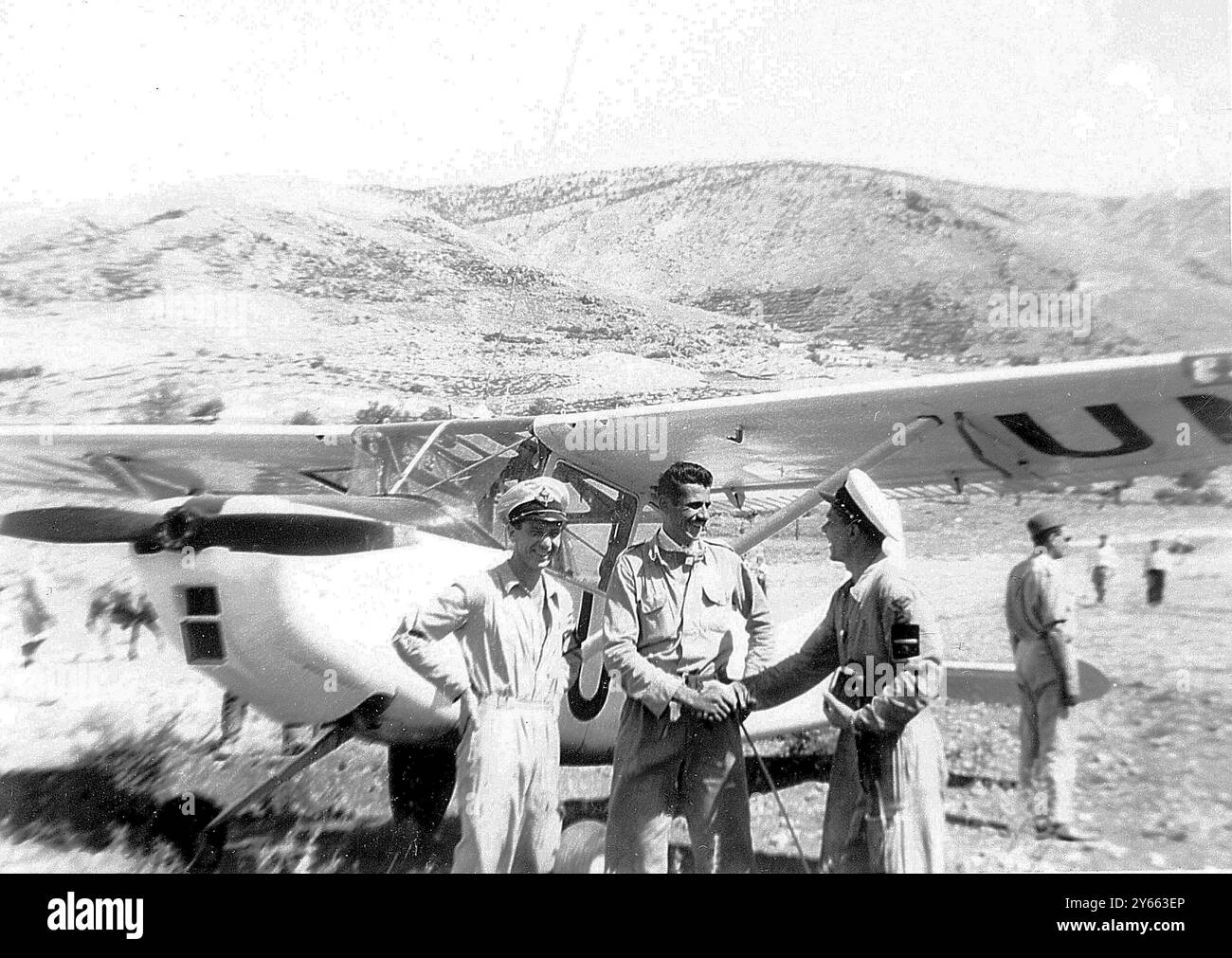 Swedish Air Force Captain P.L. Rittby ( Right) shakes hands with an ...