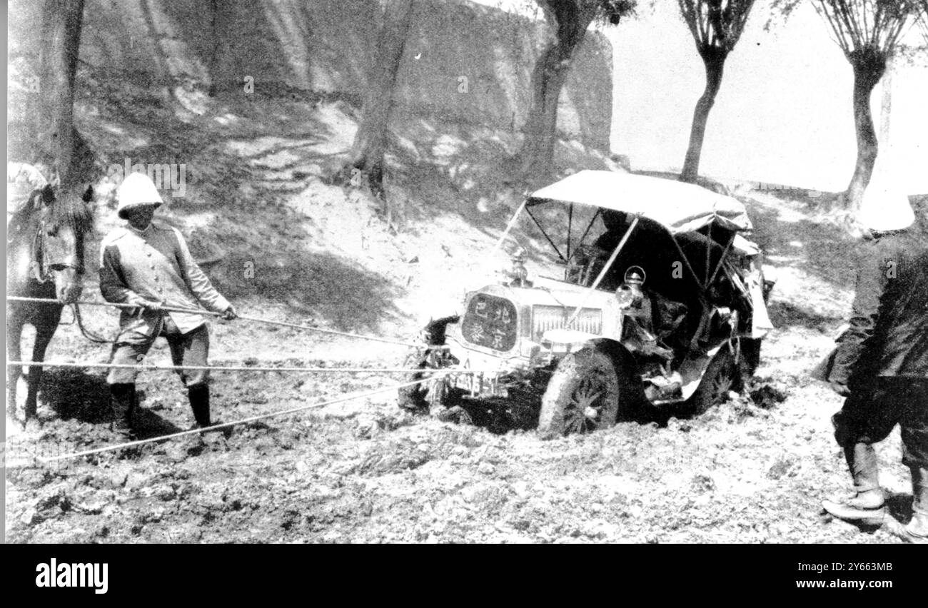 Peking - Paris motor race 1907. M Collignon's car stuck in the mud ...