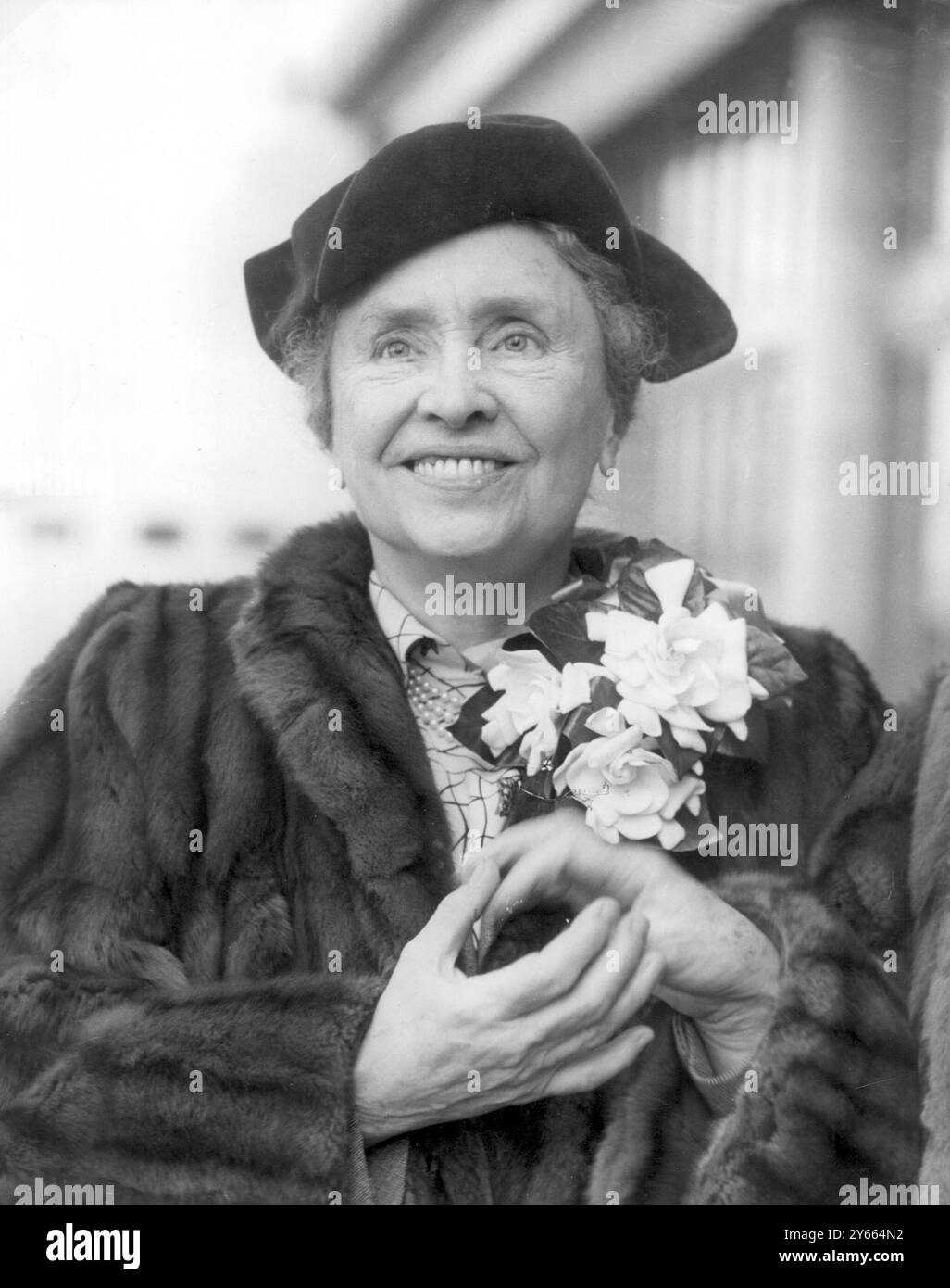 Helen Keller, the world famous deaf and blind humanitarian on her ...