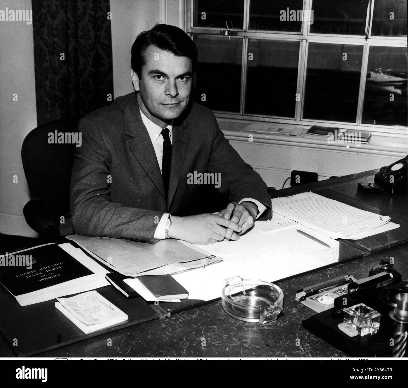 David Owen MP for Sutton at his desk at the Ministry of Defence London ...