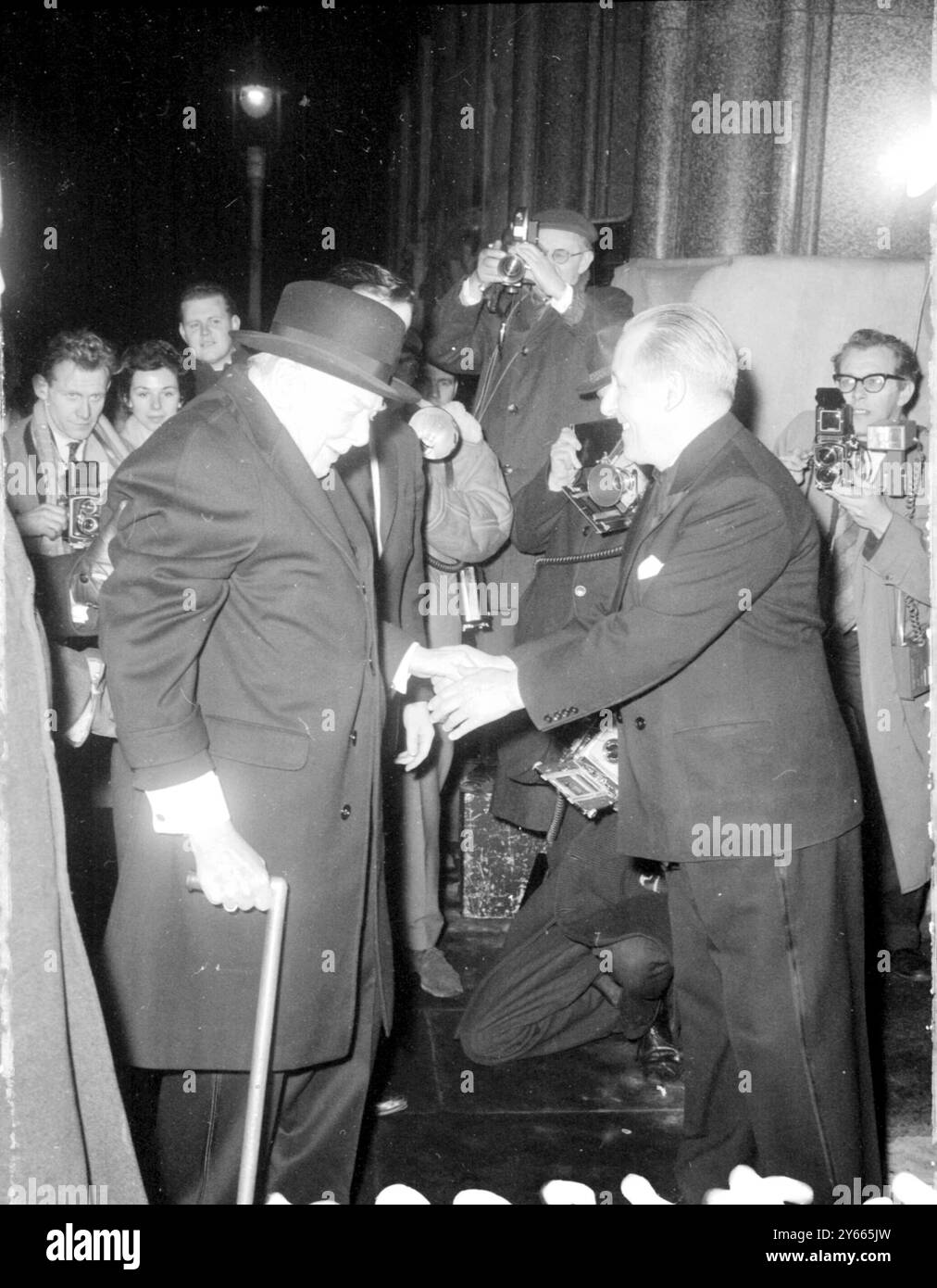Sir Winston Churchill arriving at the Savoy hotel , London to dine with ...