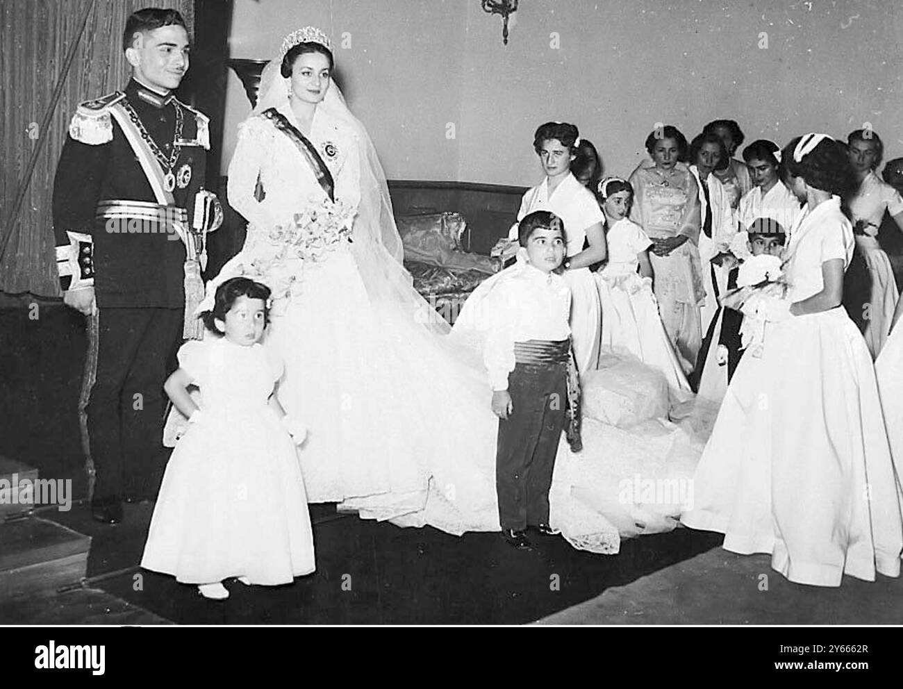 King Hussein and his bride Princess Dina Abdul Hamid. pose with the ...