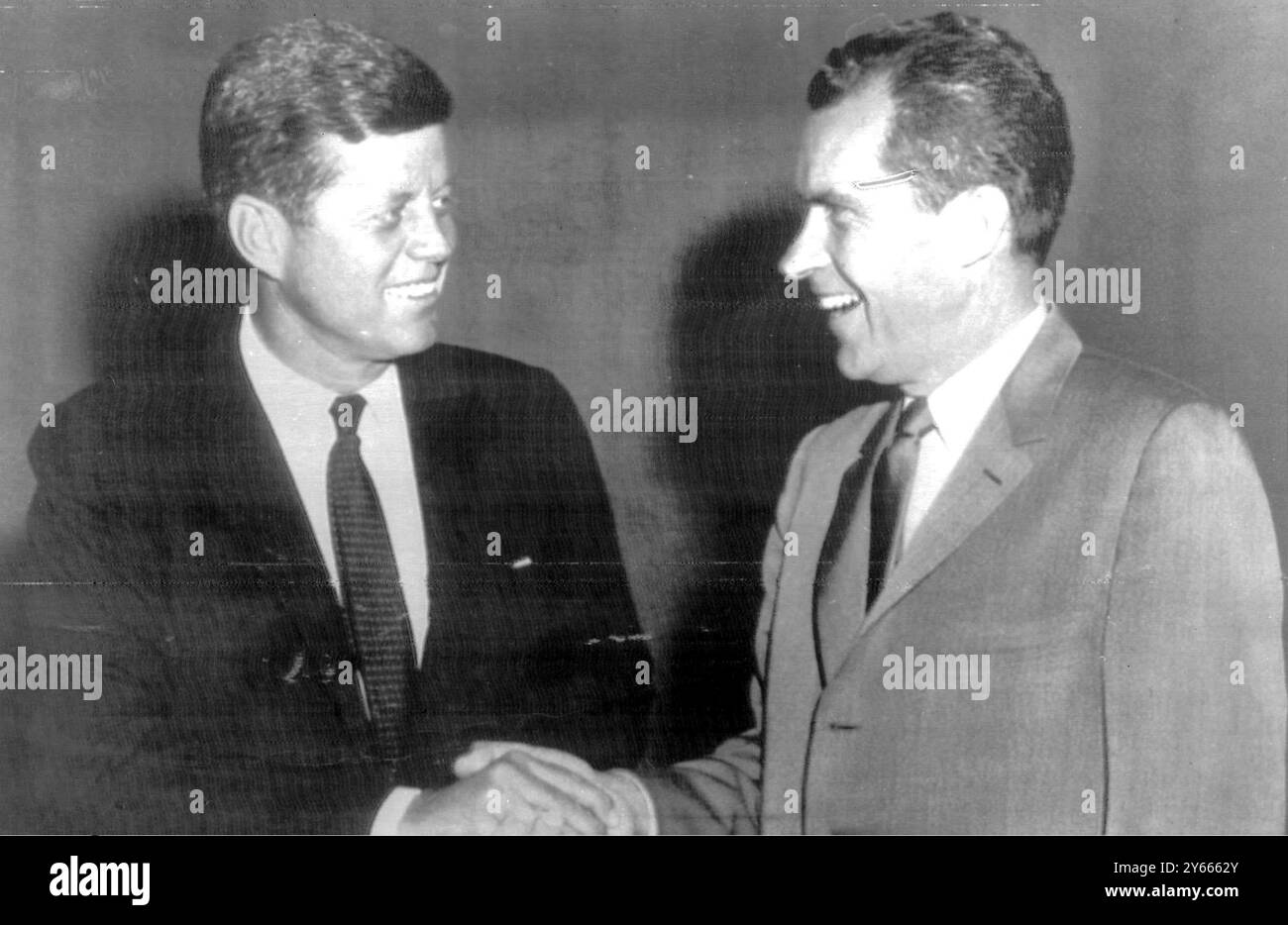 Senator Kennedy and Vice President Richard Nixon shake hands before ...