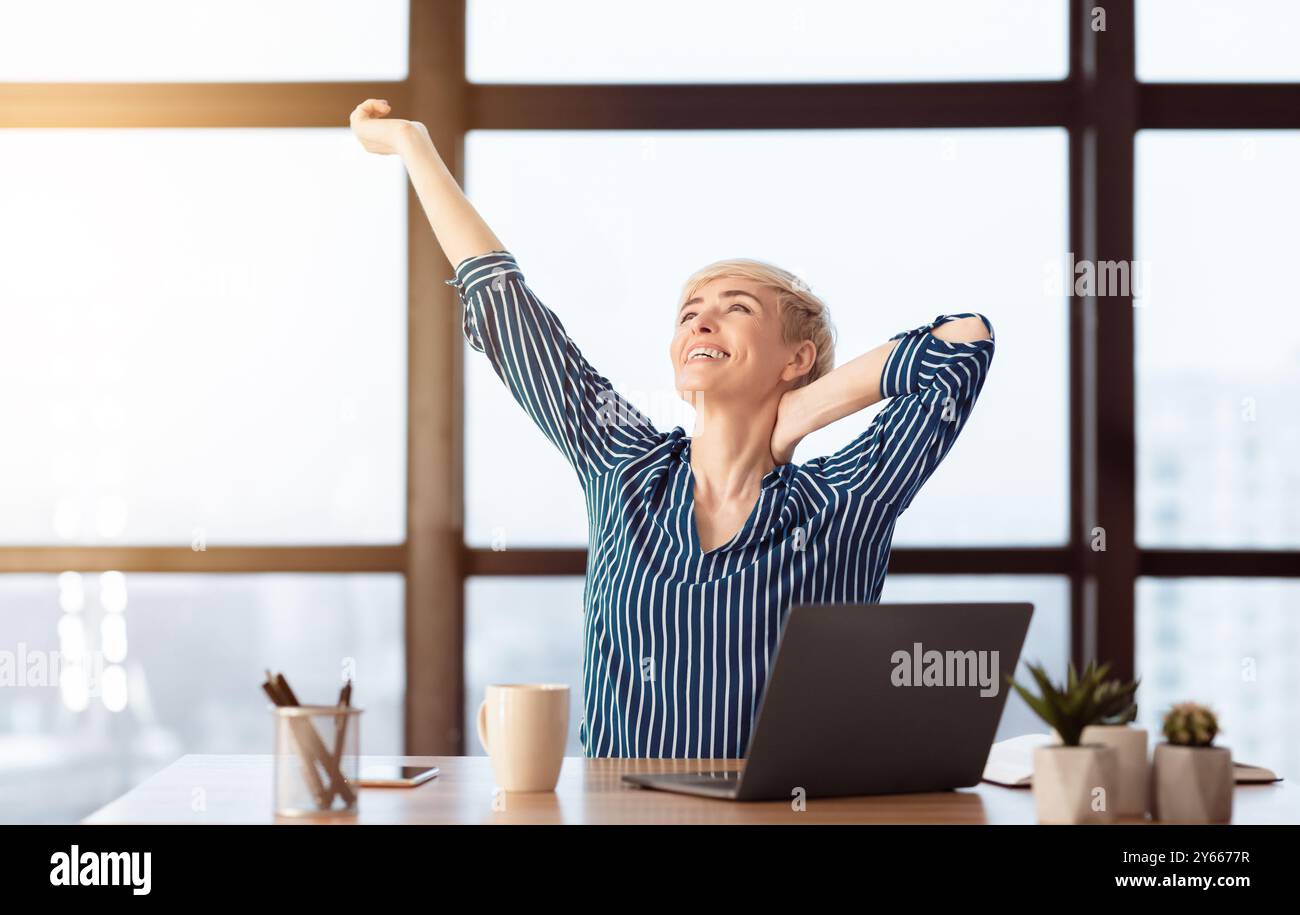 Happy Business Lady Relaxing Sitting At Workplace Indoor Stock Photo ...