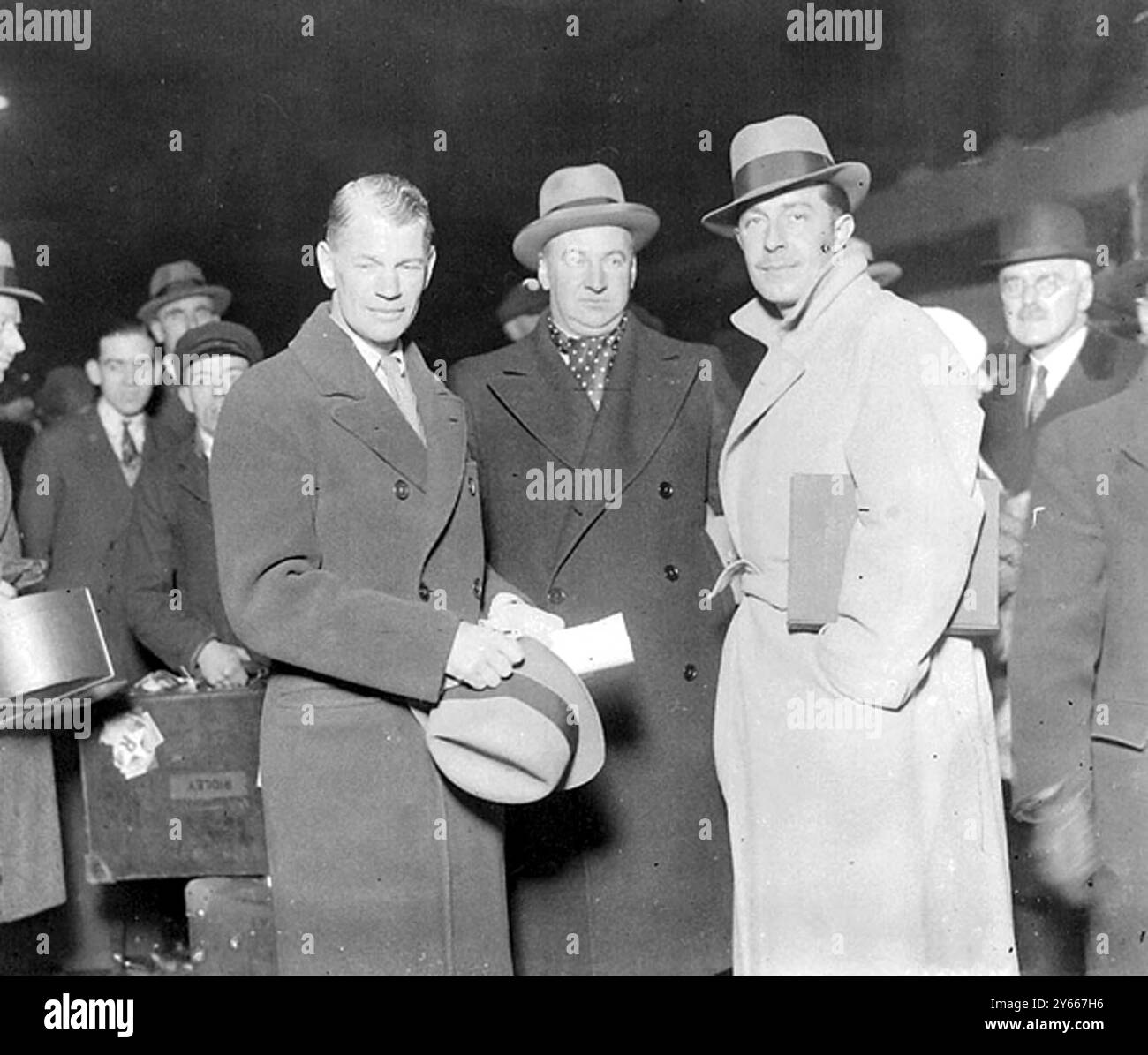 English film director , James Whale , on left without hat on arrival at ...