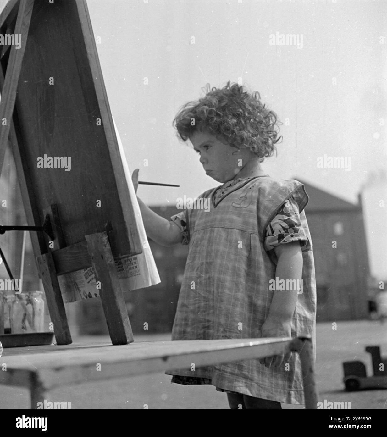 First day of school at Creek Road school , A little girl painting 1946 ...