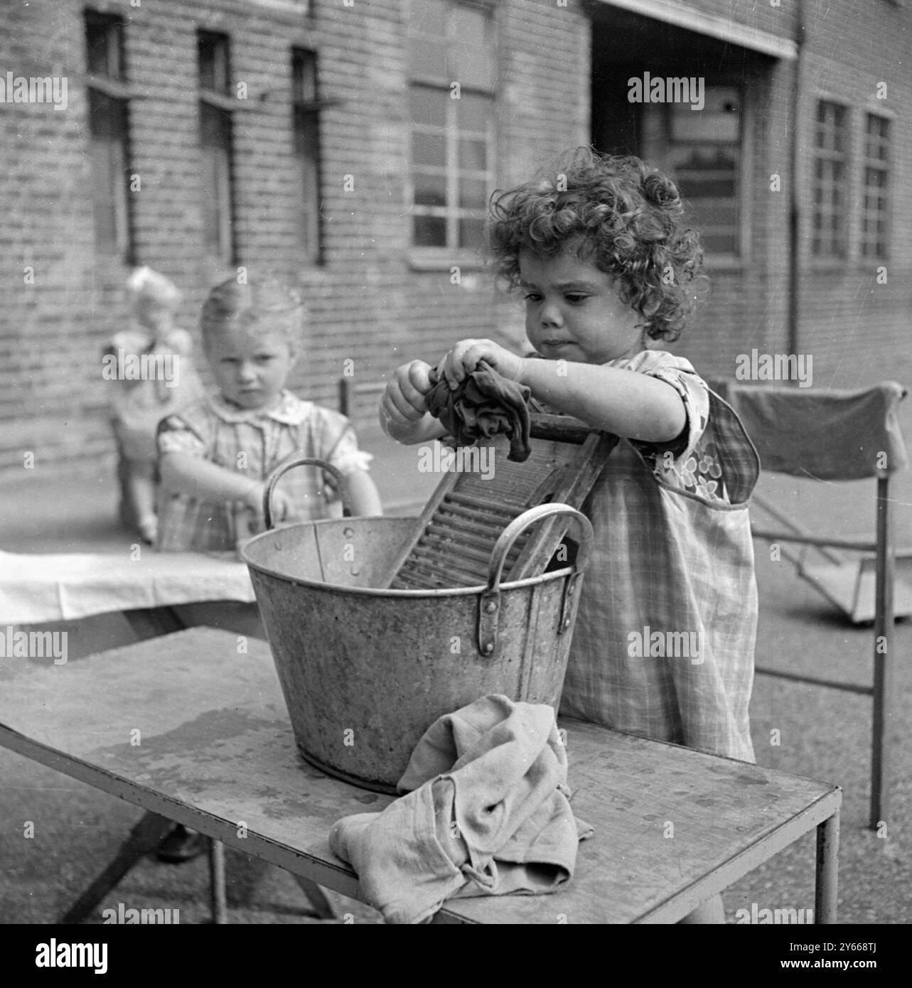 First day of school at Creek Road school , A little girl doing the ...