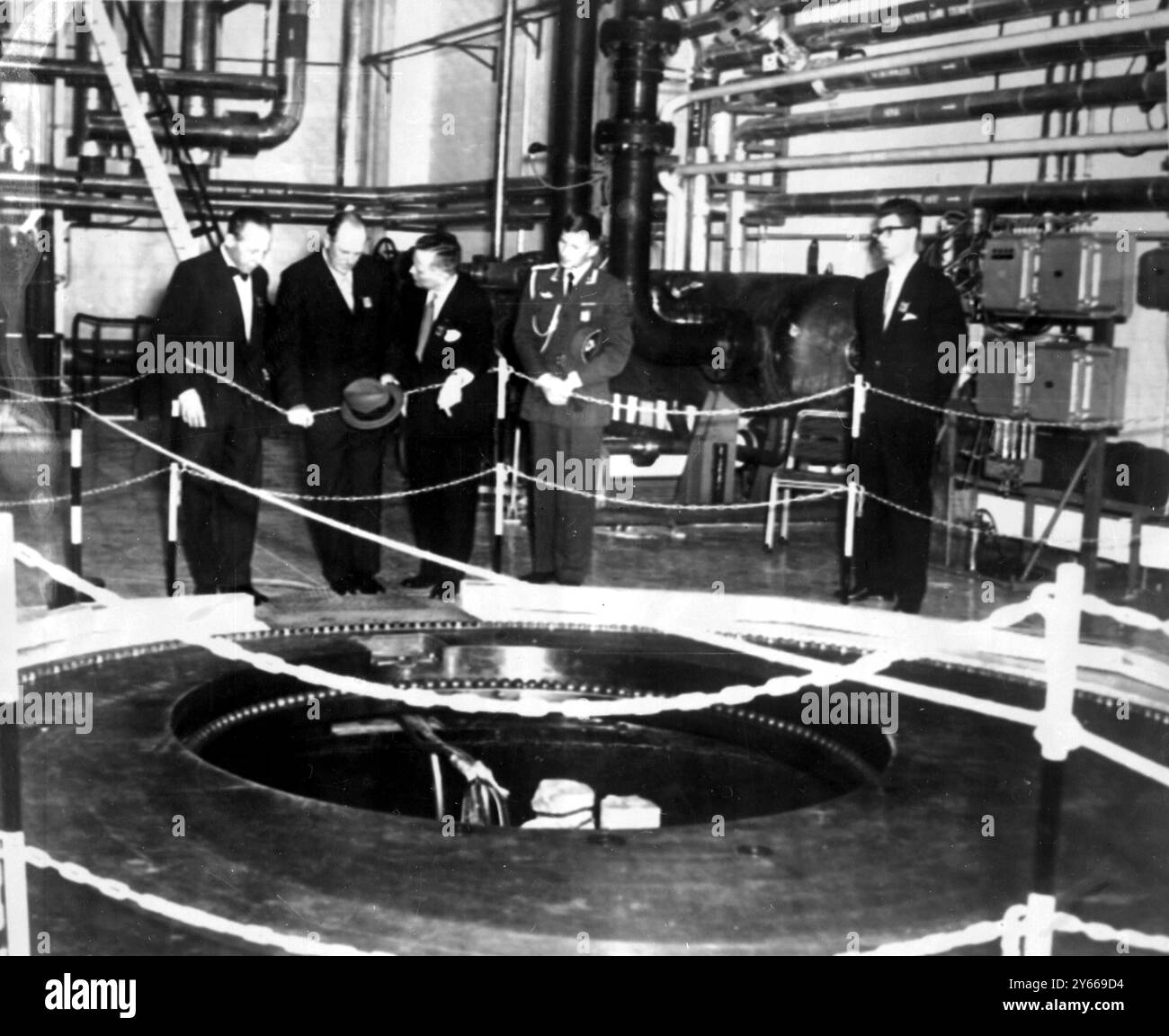 King Olav of Norway inspecting the Halden Reactor in Norway also seen ...
