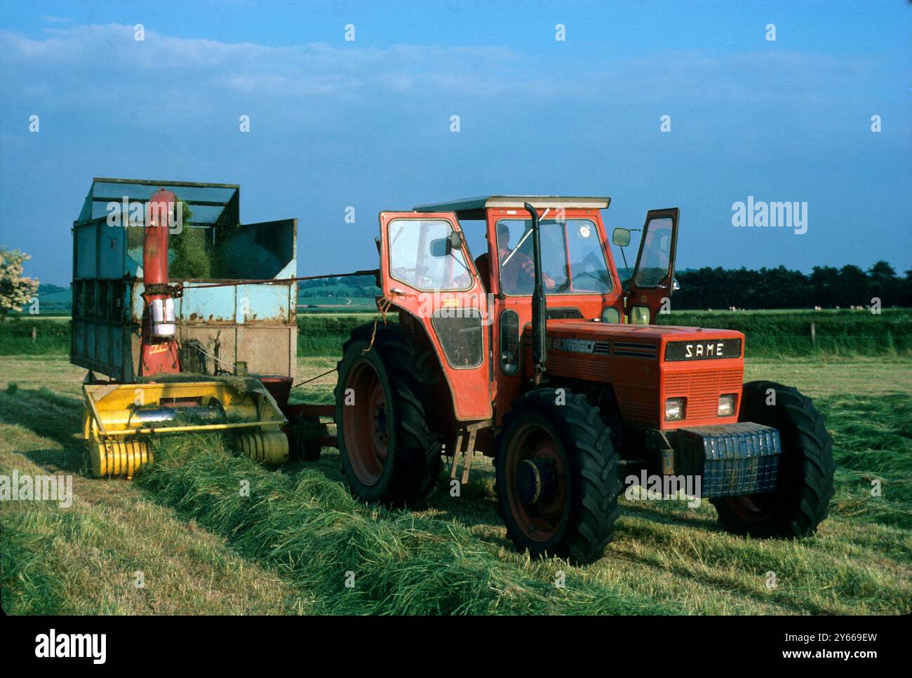 Early Summer : Silage making picking up windrows with the same drago ...