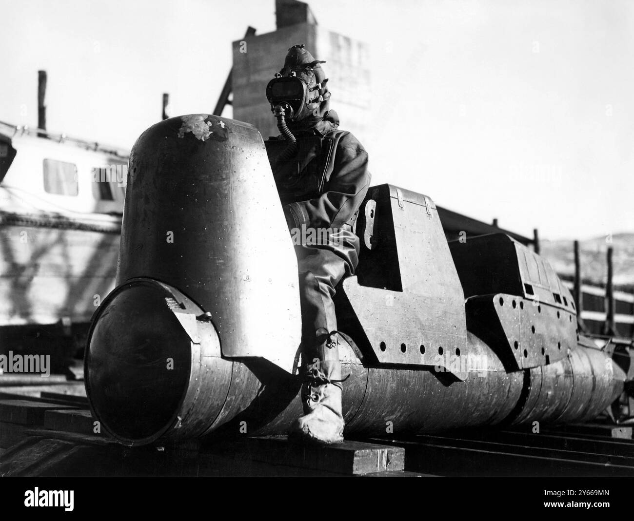 Commanding Officer of a "Human Torpedo" at the controls. Note the ...