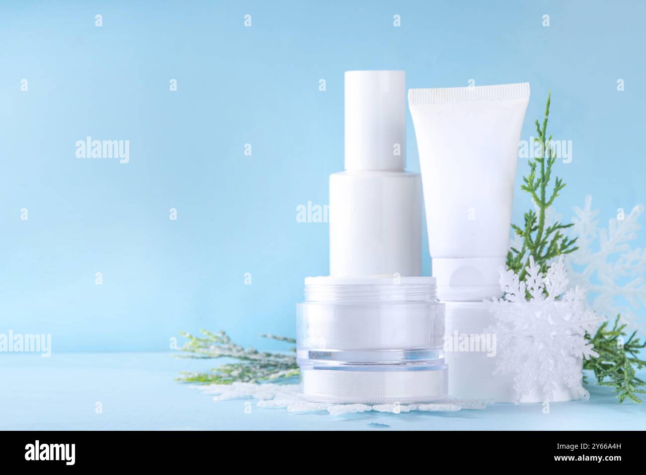 Cold protecting winter cream concept. Simple tubes and jar cosmetics ...