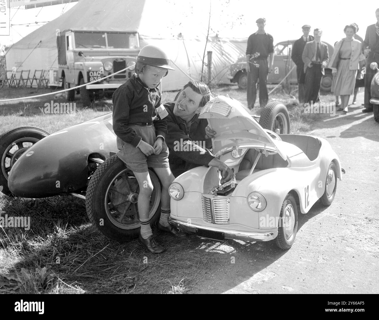 Ken Tyrrell, racing driver with his son Bobby aged 6 who is competing ...