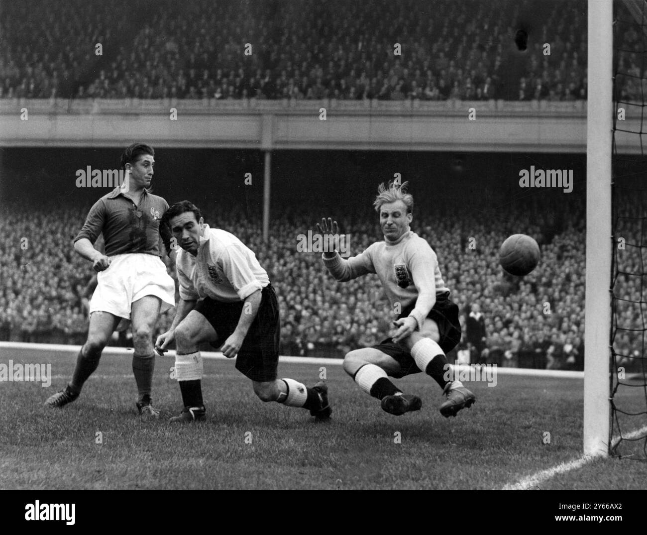 England v France. France's outside-right, Rene Alpsteg beats England's ...