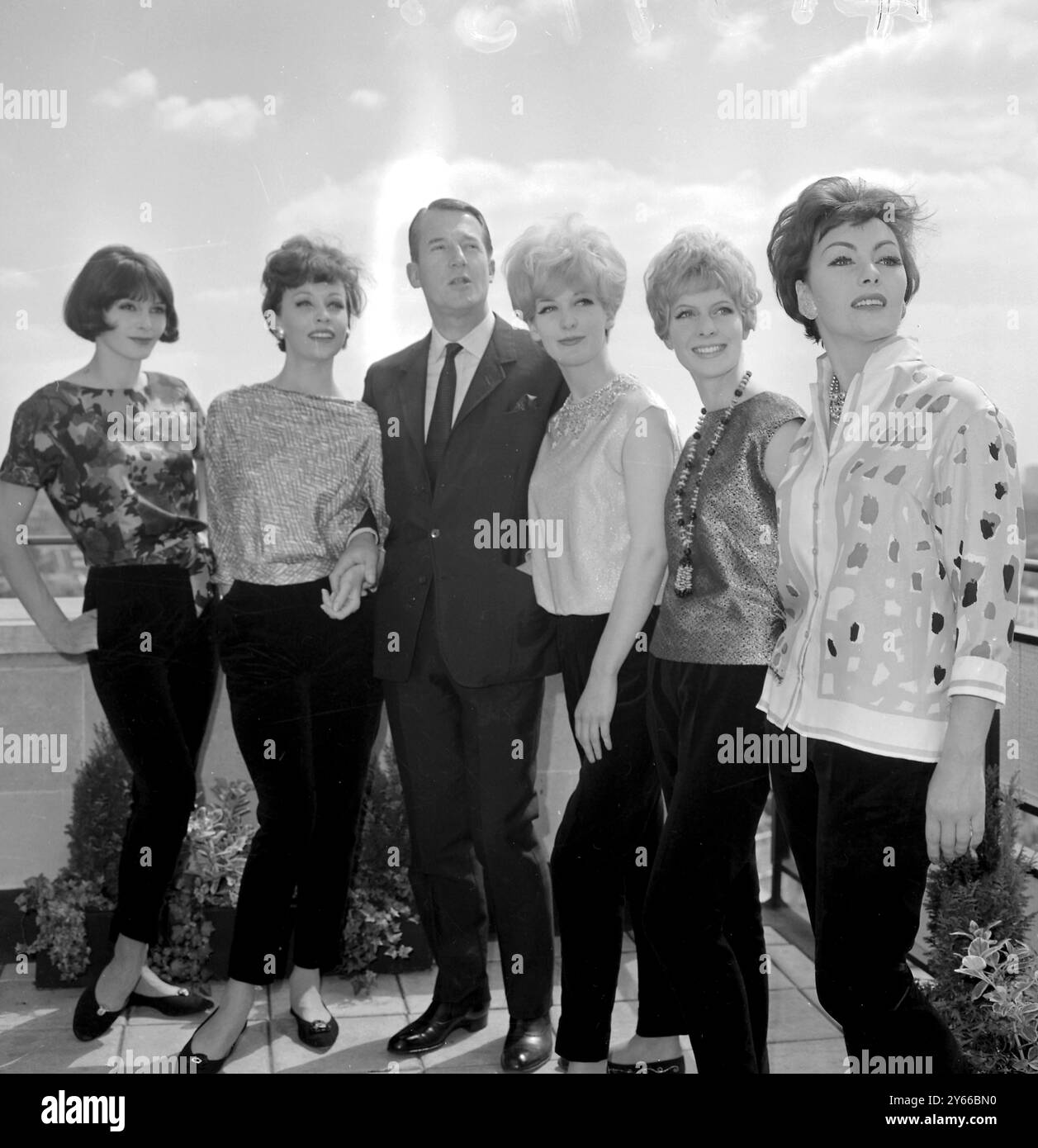 London: Designer Hardy Amies on roof of The Carlton Towers Hotel. with ...