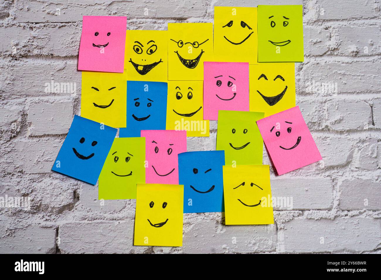 Conceptual image of different post-its of various colors with different ...