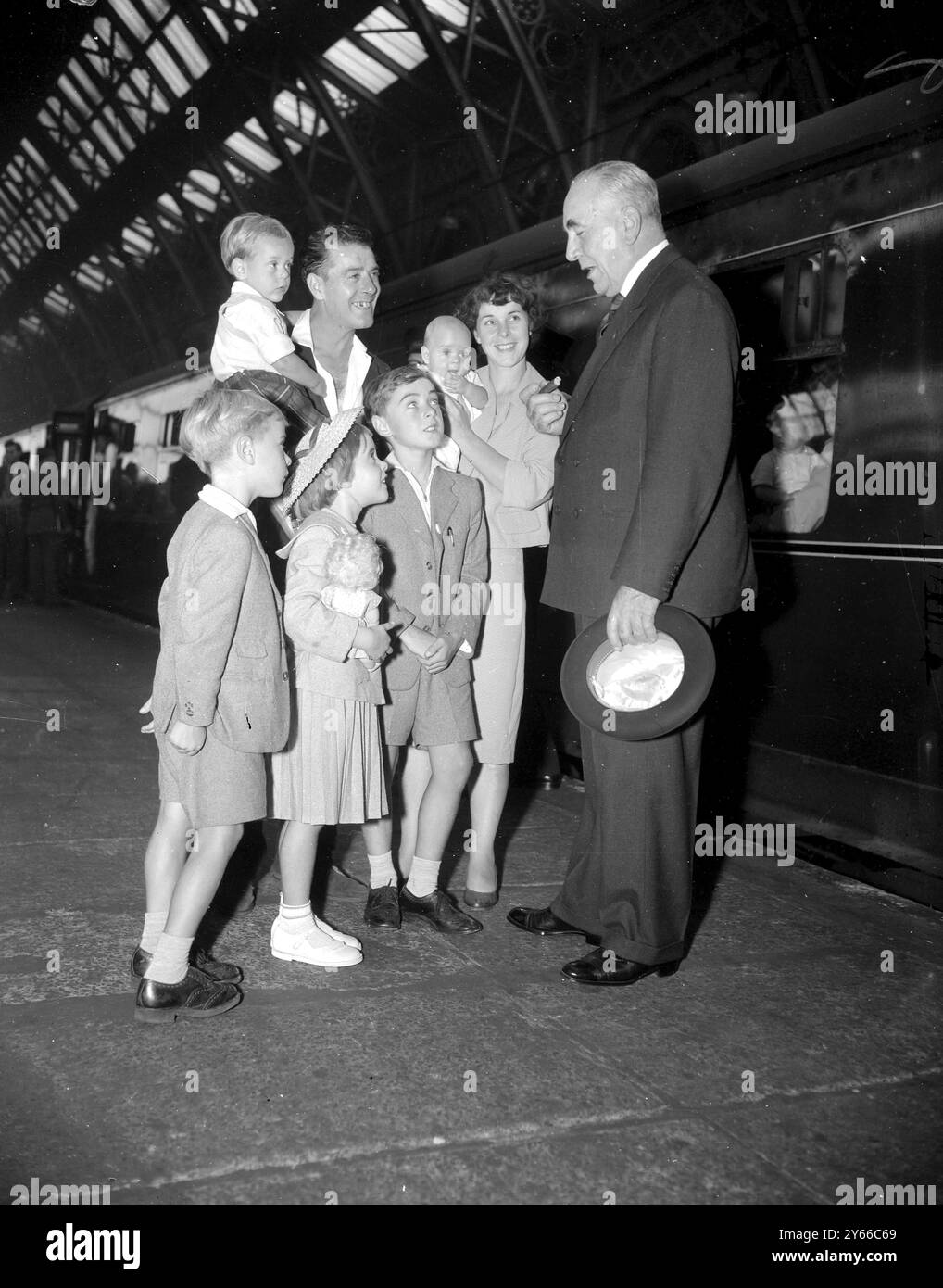 Australian High Commissioner Sir Eric Harrison with a family at St ...