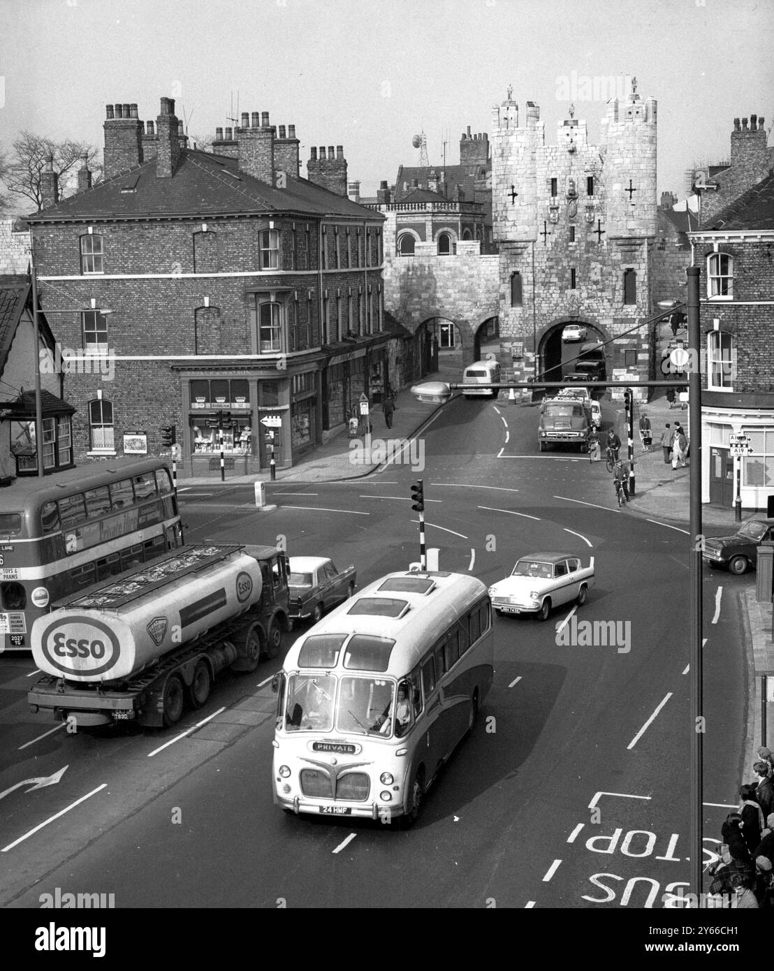 Standing with the serenity of age amid and over (for Vehicles pass ...