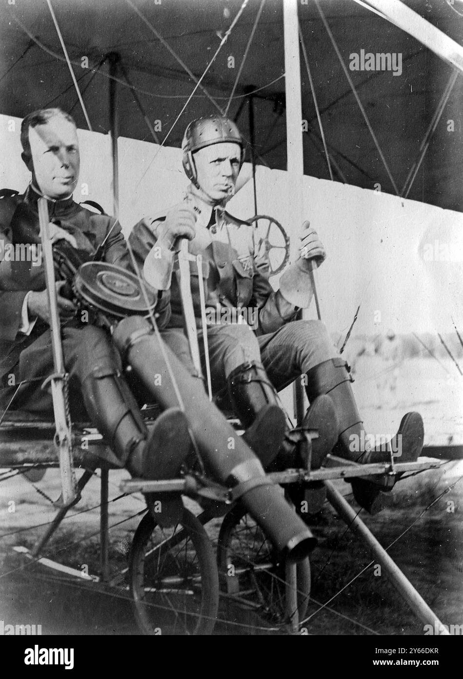 Lewis Aeroplane Gun. Capt. Chandler ready to operate the Lewis gun from ...