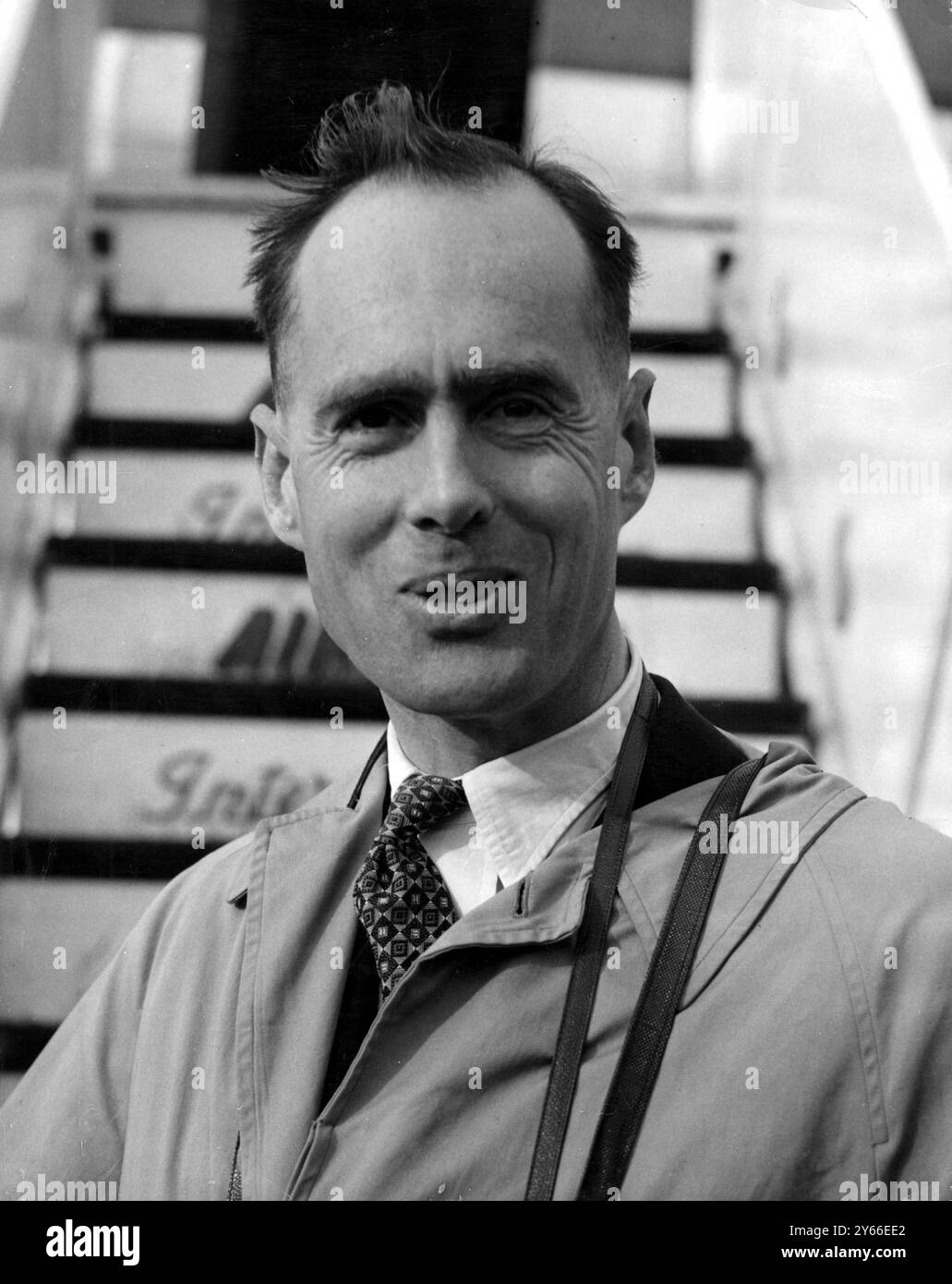 Group-Captain Leonard Cheshire, V.C. pictured boarding a flight to ...
