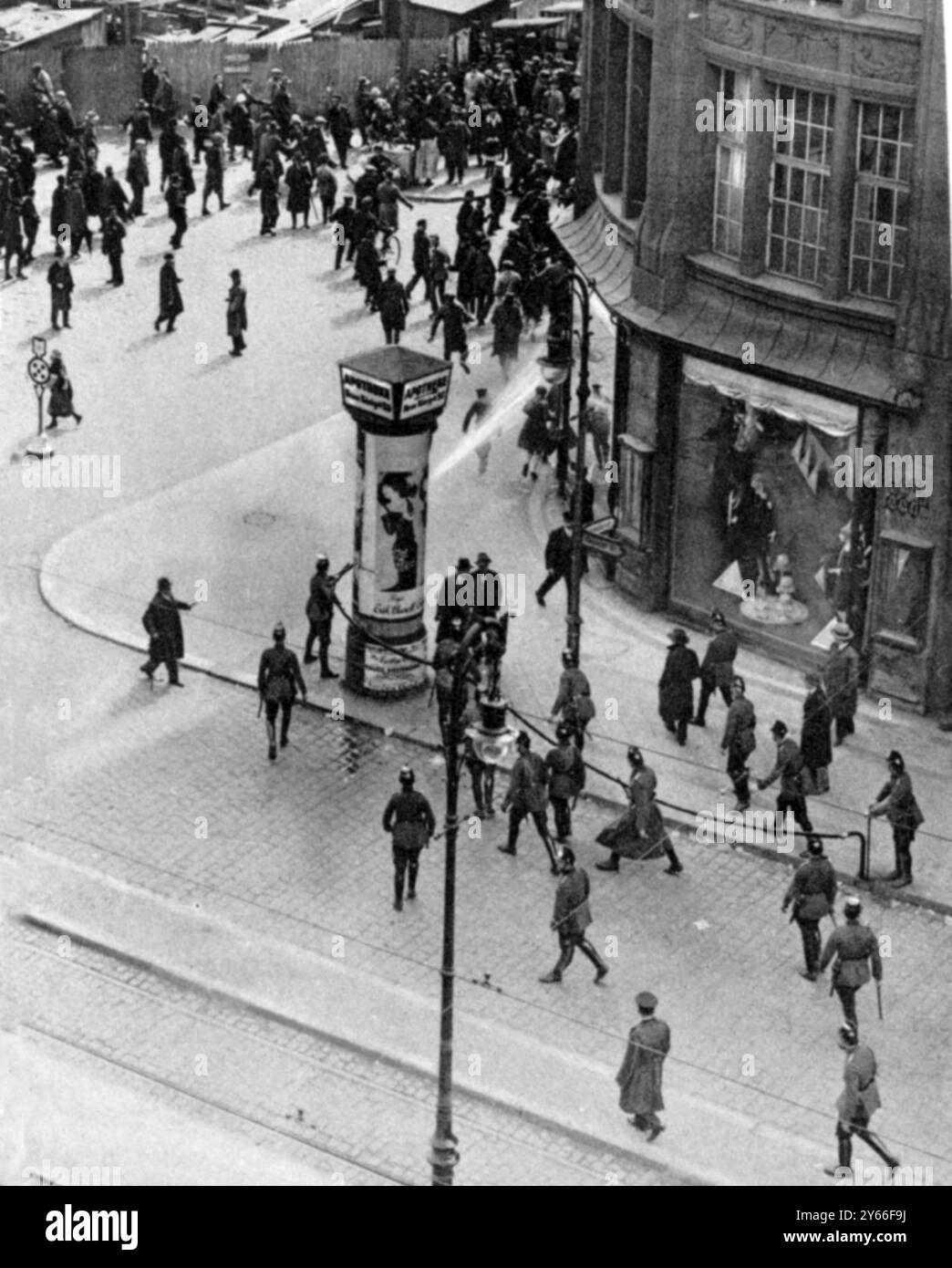 The Communist Riots in Berlin water used to damp the ardour of Berlin ...
