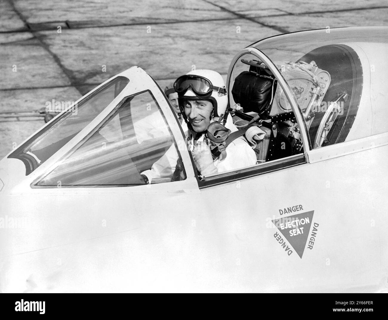 Neville Duke in the cockpit of a modern plane 11 December 1952 Stock ...