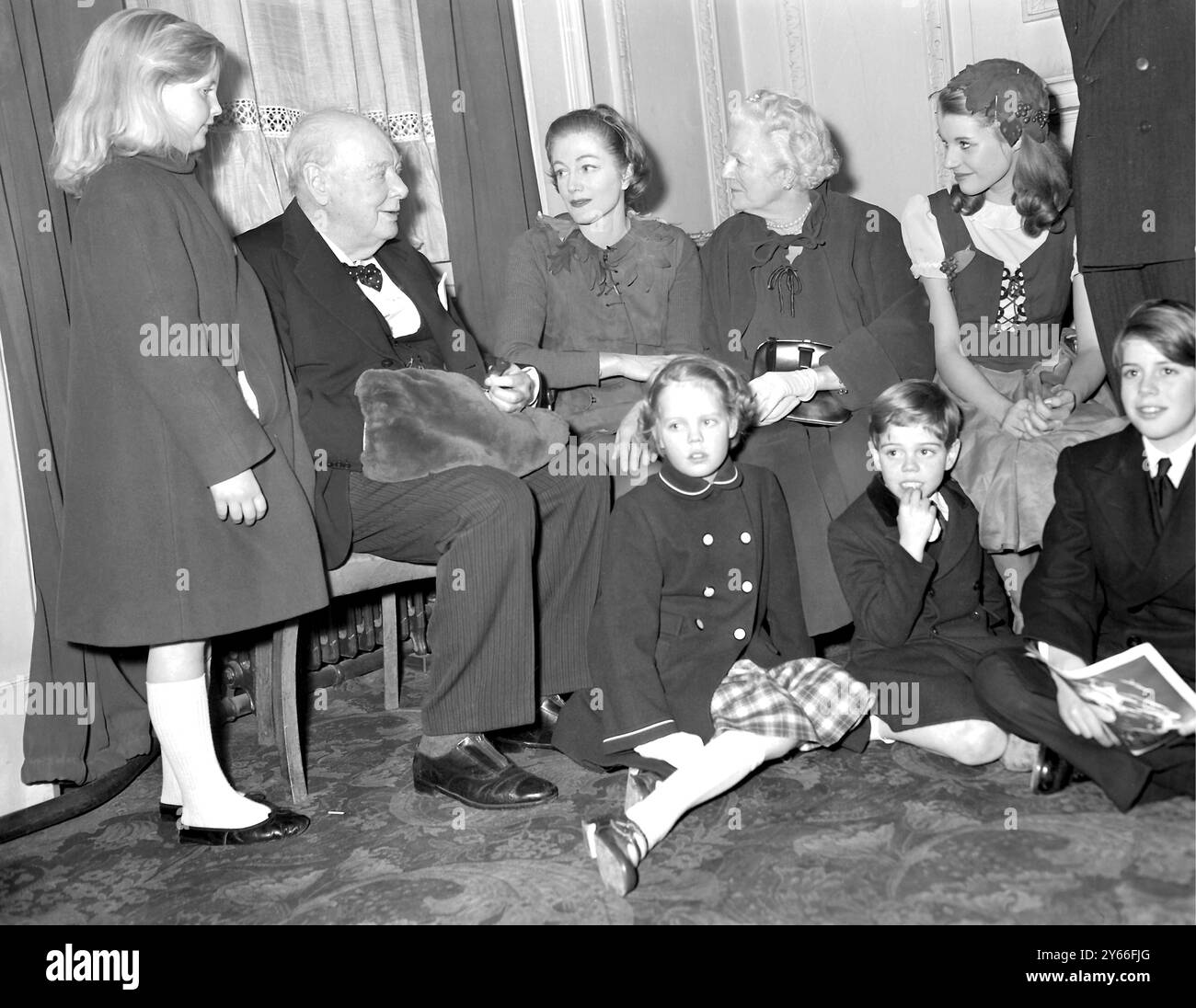 London: Churchill family at a pantomime; Sir Winston and Lady Churchill ...
