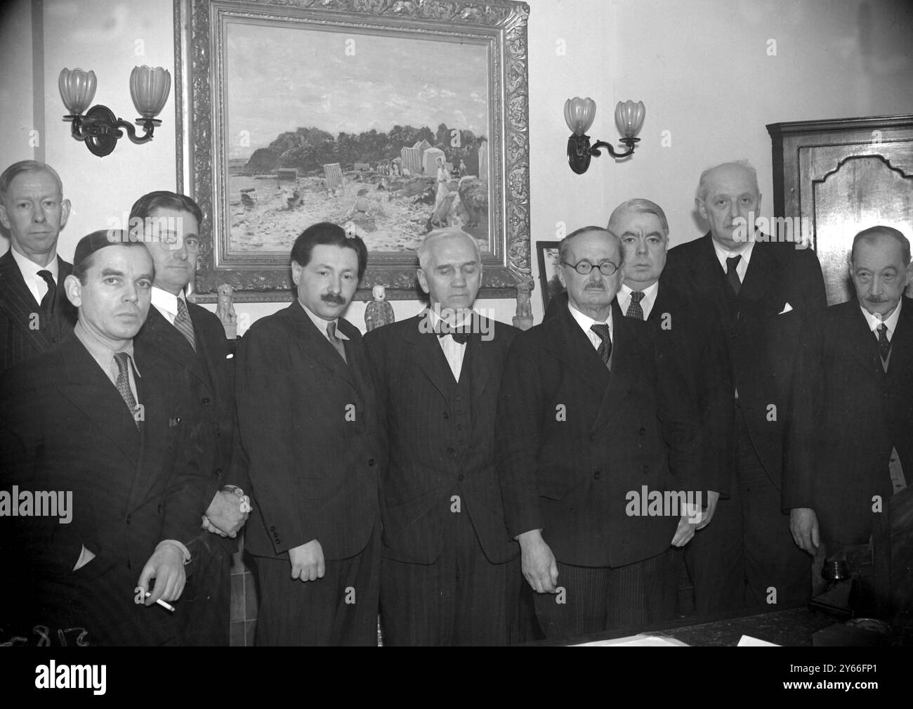 (left to right) Dr J T Christie, Mr Geoffrey Harmsworth, Sir Howard ...