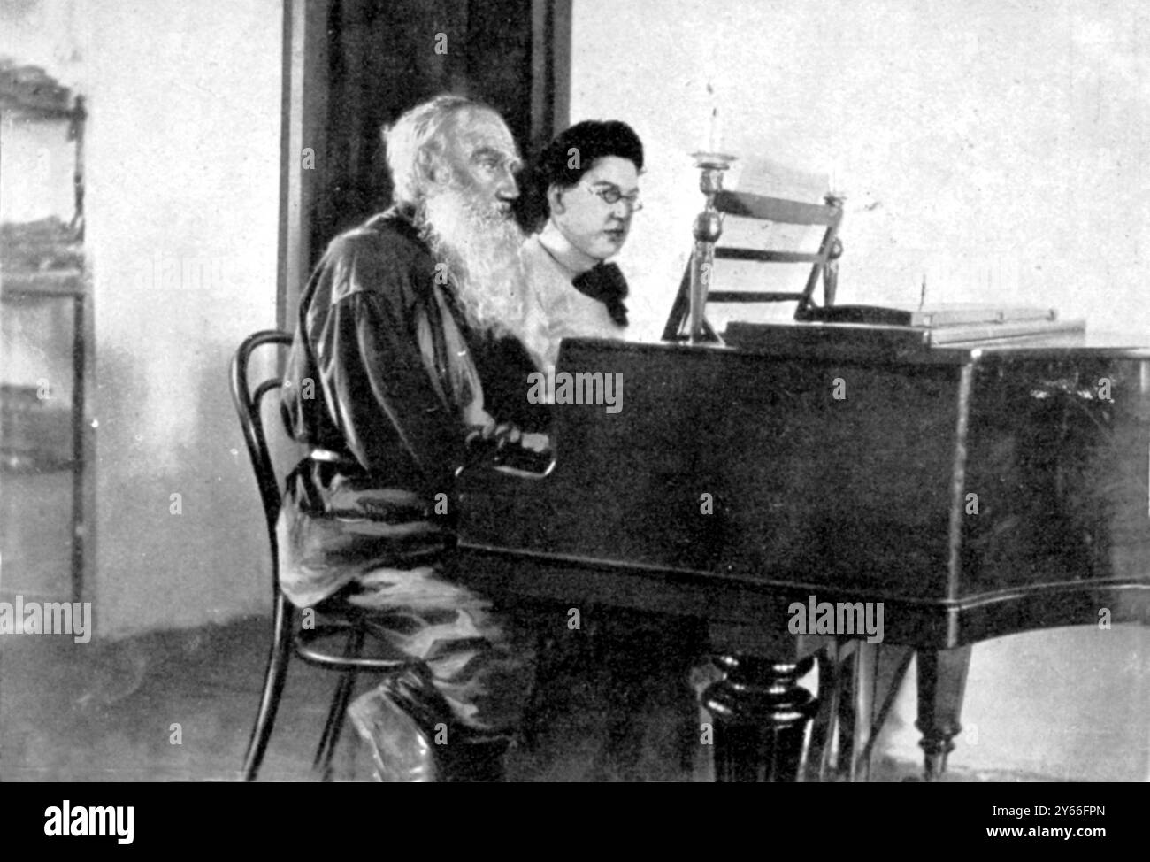 Count Tolstoy and his daughter at the Piano Stock Photo - Alamy