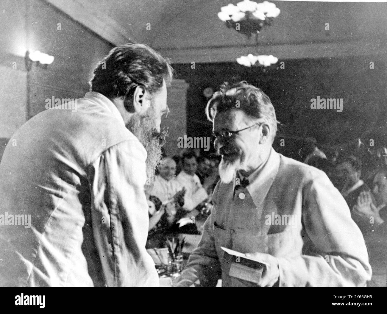 Professor Otto Schmidt, receiving the Order of Lenin and certificate of ...