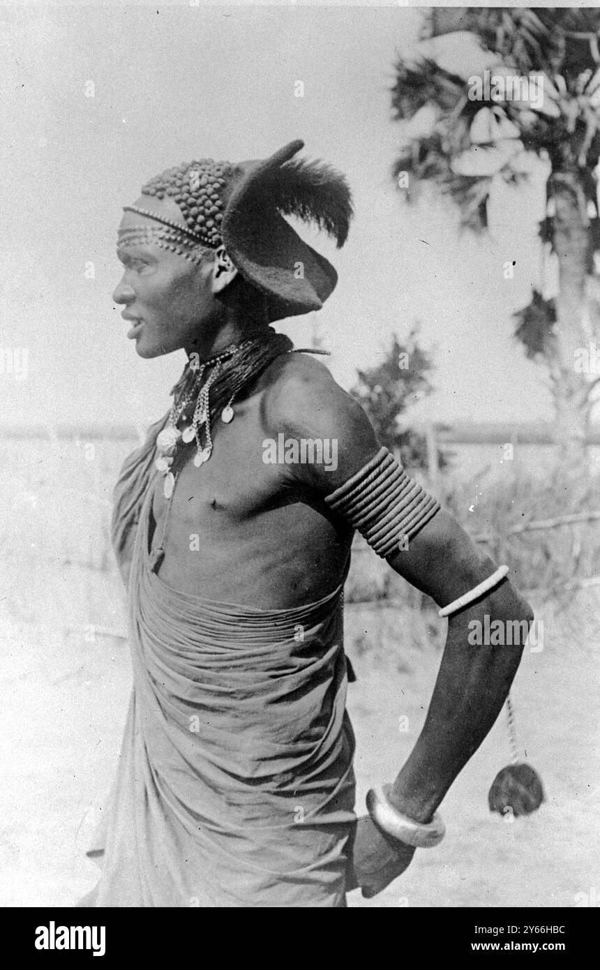 A Shilluk native in Sudan photographed after dressing hair into dainty ...