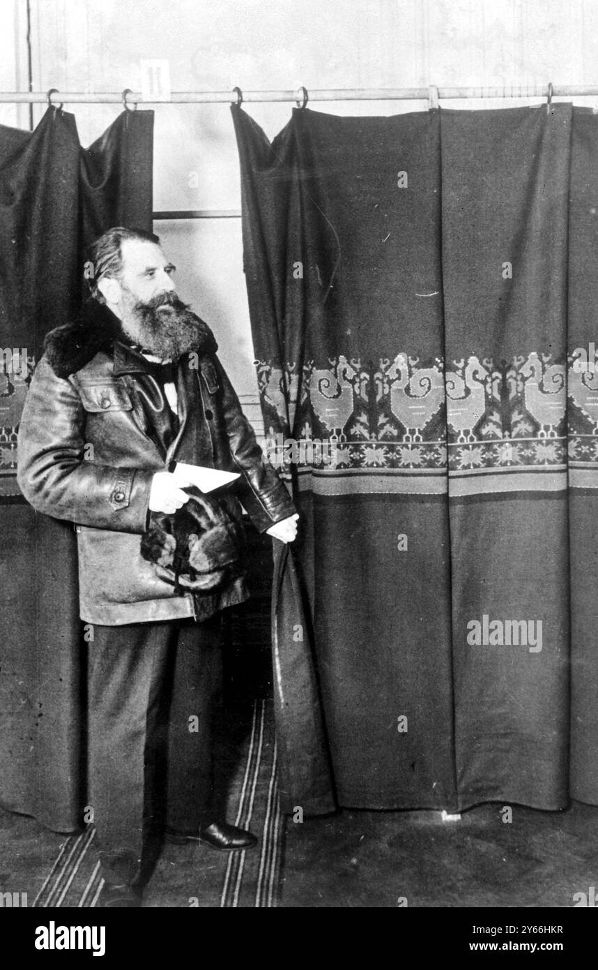 Bearded Professor Otto Schmidt, Hero of the Soviet Union leaving a ...