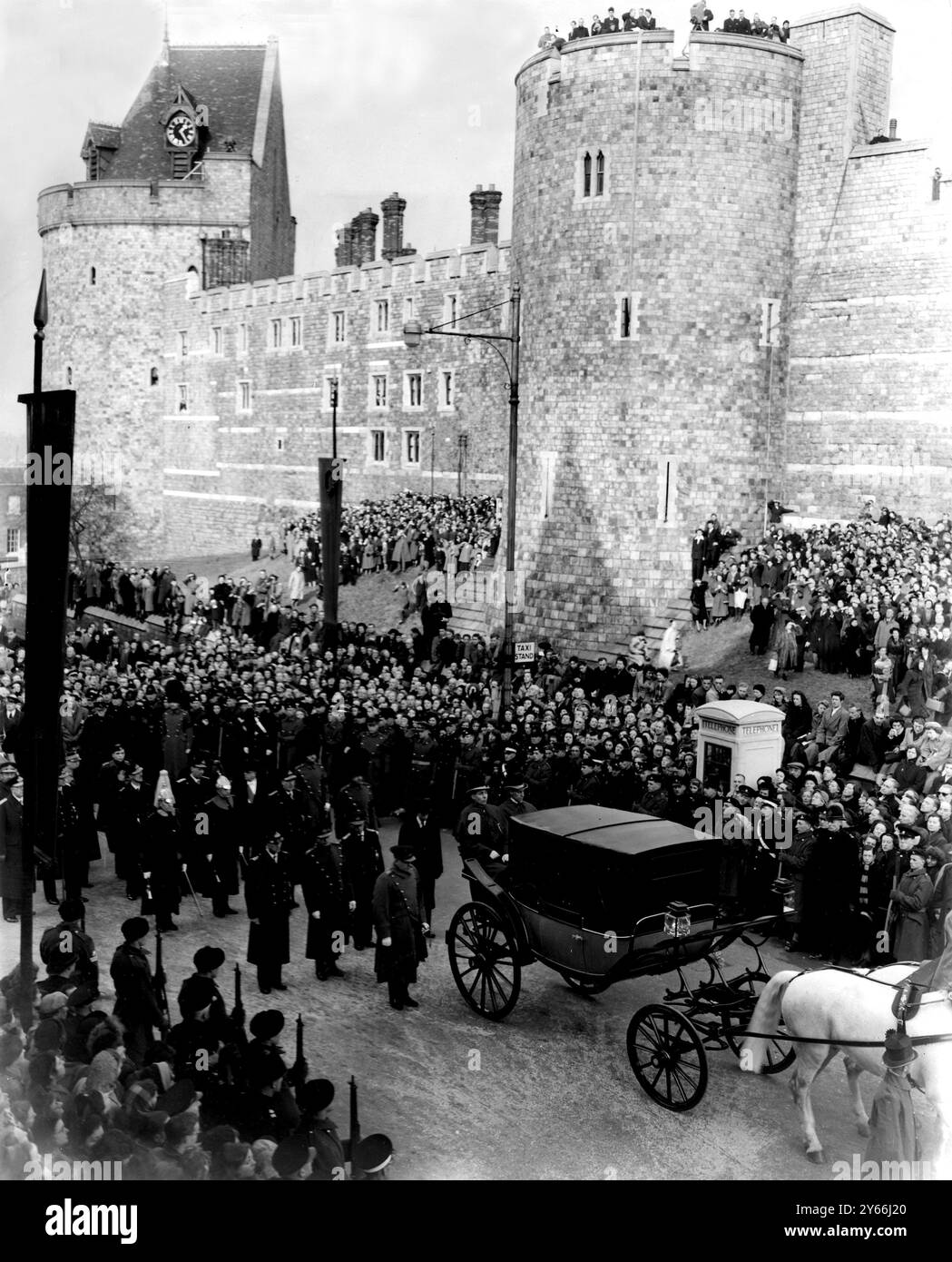 Dukes walk behind the carriage conveying the Queen, Queen Mother ...