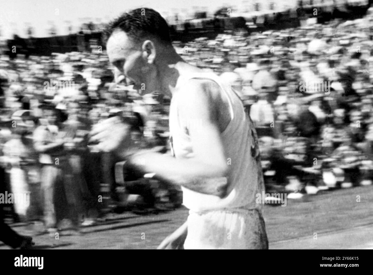 The Agony of Jim Peters Marathon runner close up the athlete is a mile ...