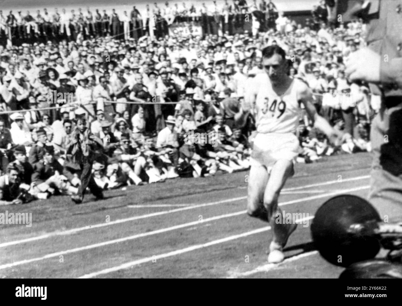 The Agony of Jim Peters Marathon runner as he lurches into the stadium ...