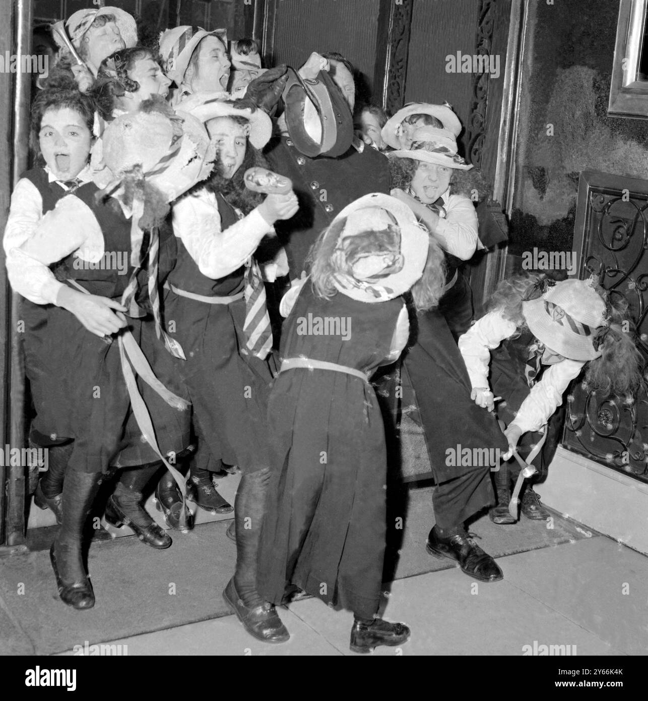 The girls of "St Trinian's" - give a typical St Trinian's rush to get ...