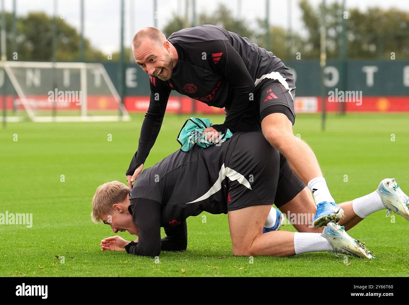 Manchester United's Christian Eriksen (top) and Rasmus Hojlund during a ...