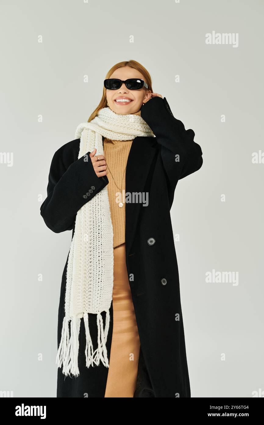 Merry woman in elegant warm attire posing actively Stock Photo - Alamy