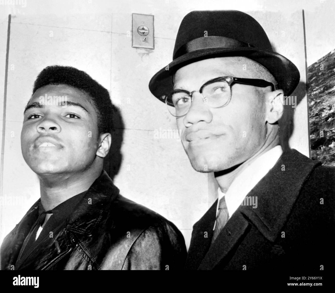 World heavyweight champion Cassius Clay (left) with Malcolm X the ...