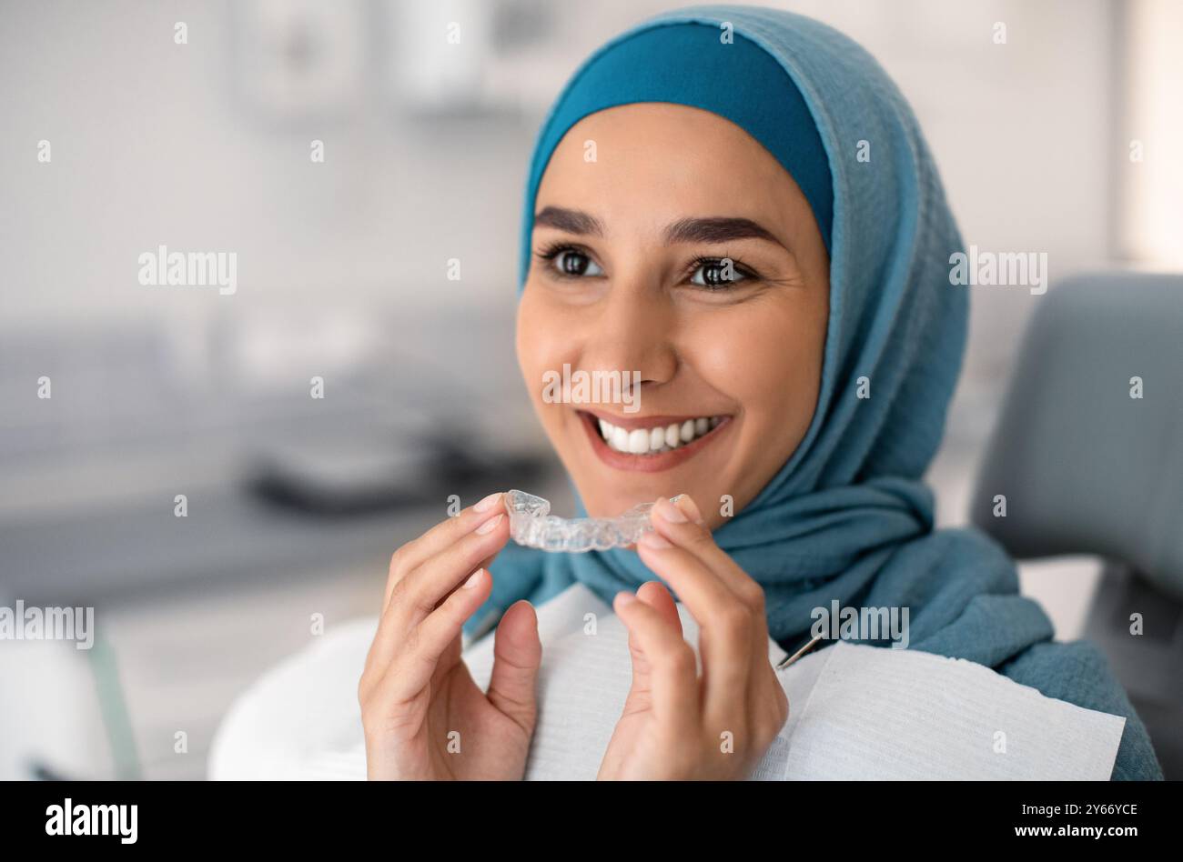 Young female dentist holding invisalign hi-res stock photography and ...
