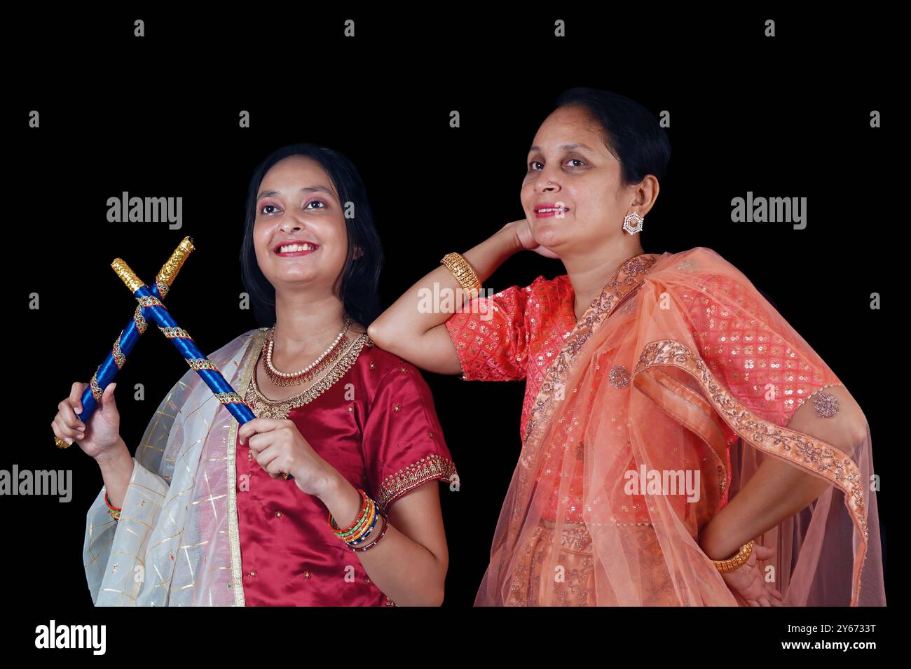 In preparation for the vibrant Navratri festival, two women are seen ...