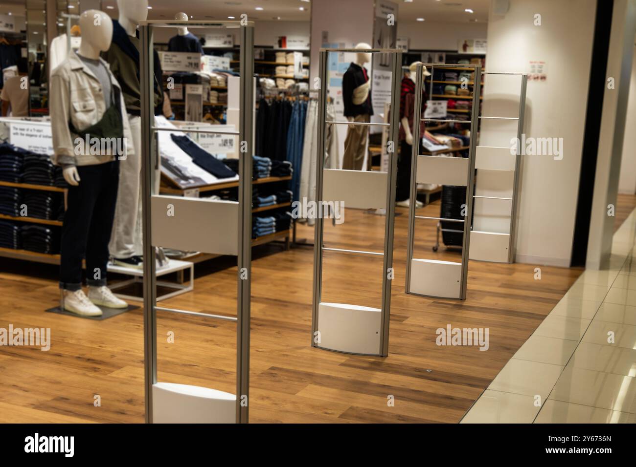 Electronic anti-theft gate system at retail shop entrance to deter ...