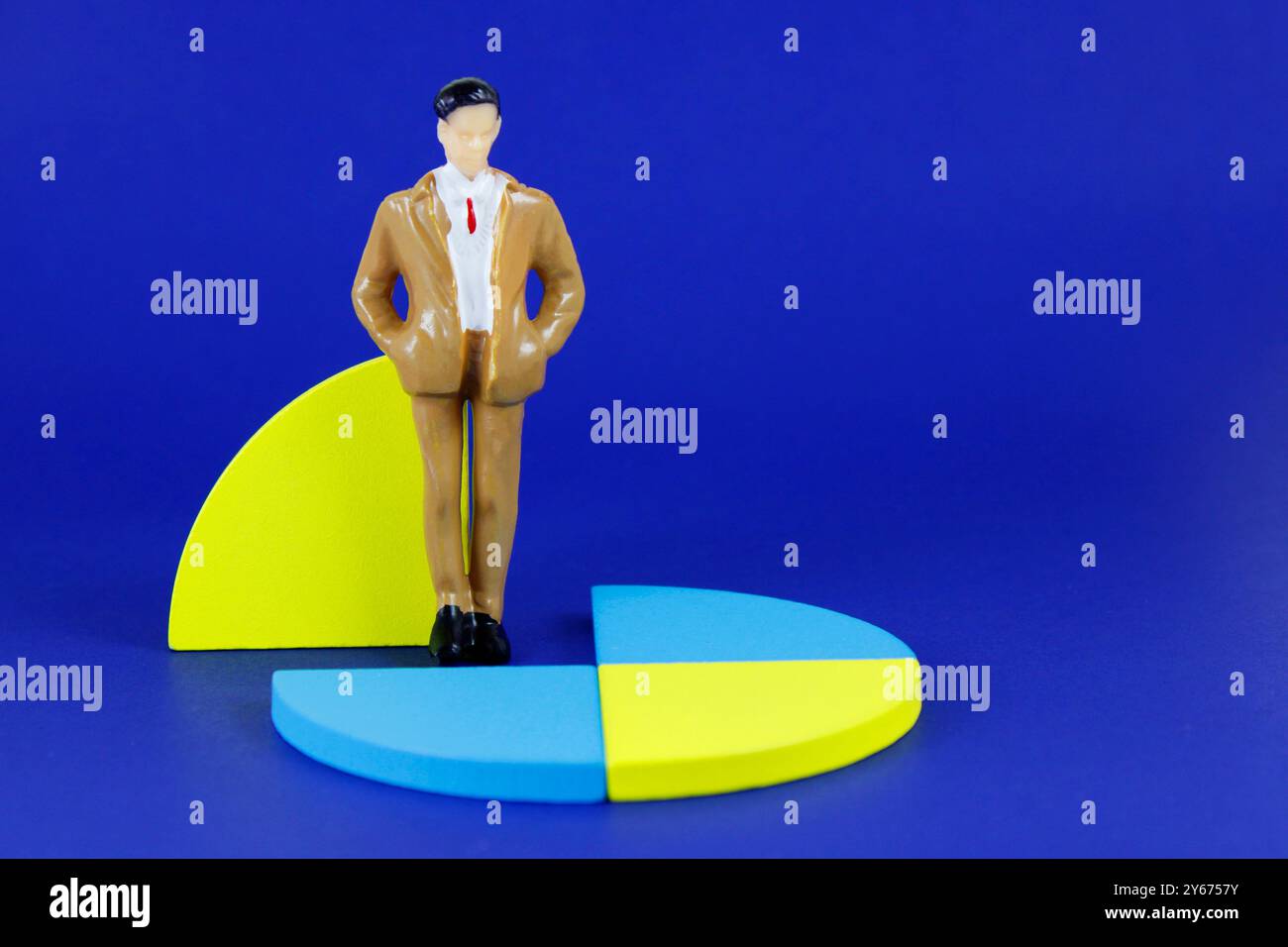 Executive separating a piece of pie chart Stock Photo - Alamy