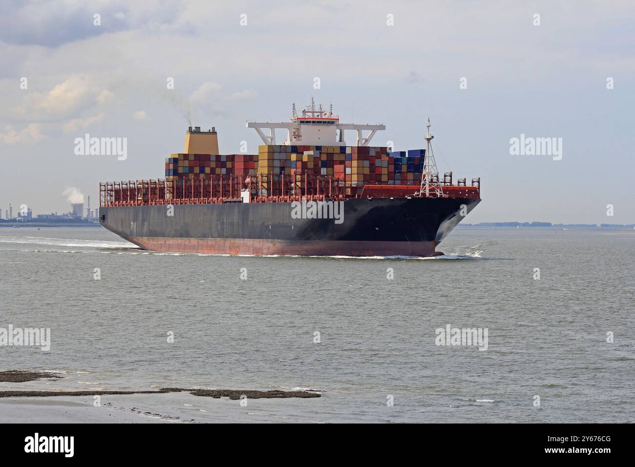 Cargo ship sails in water hi-res stock photography and images - Alamy
