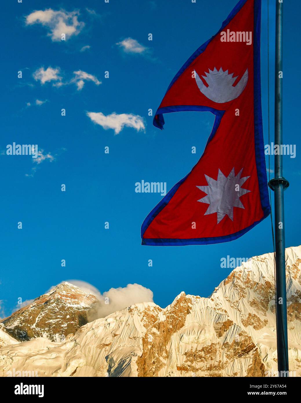 Waving nepalese flag. Mount Everest peak from Khumbu valley, Solukhumbu ...