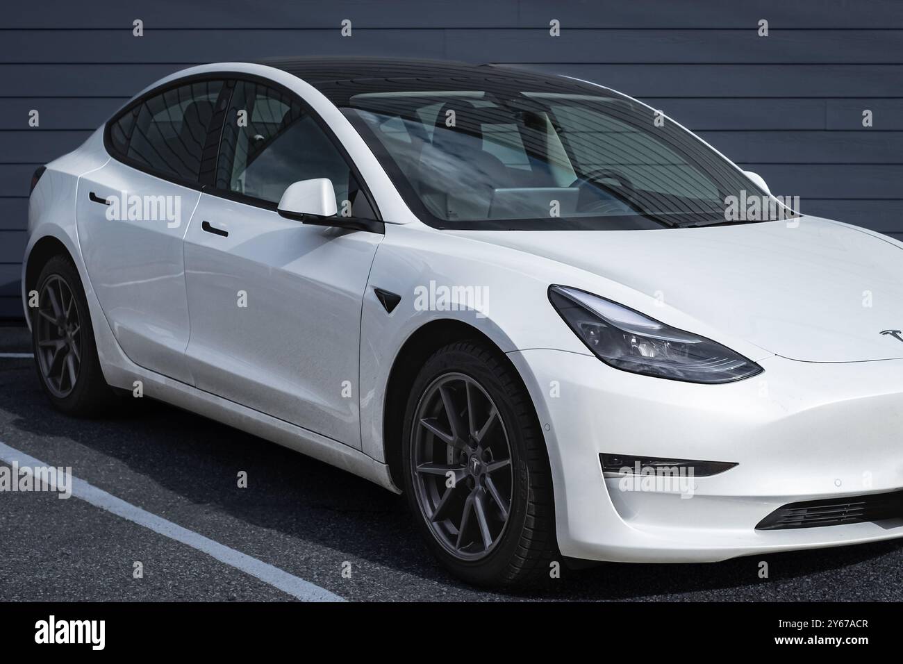 A white Tesla Model S 2022 front view. Tesla Motors electric car parked ...