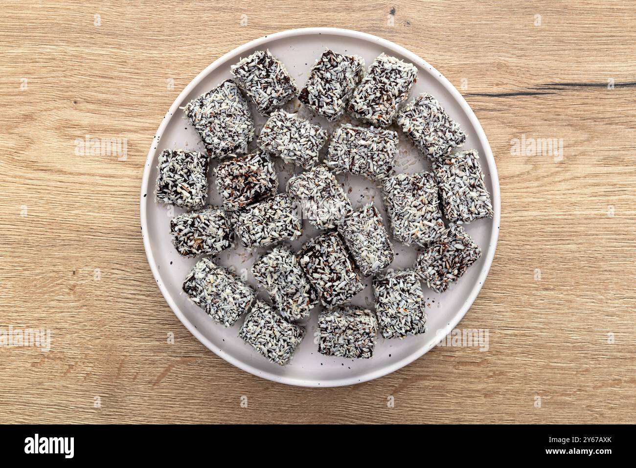 Australian Leamington dessert covered with coconut flakes lying on a ...
