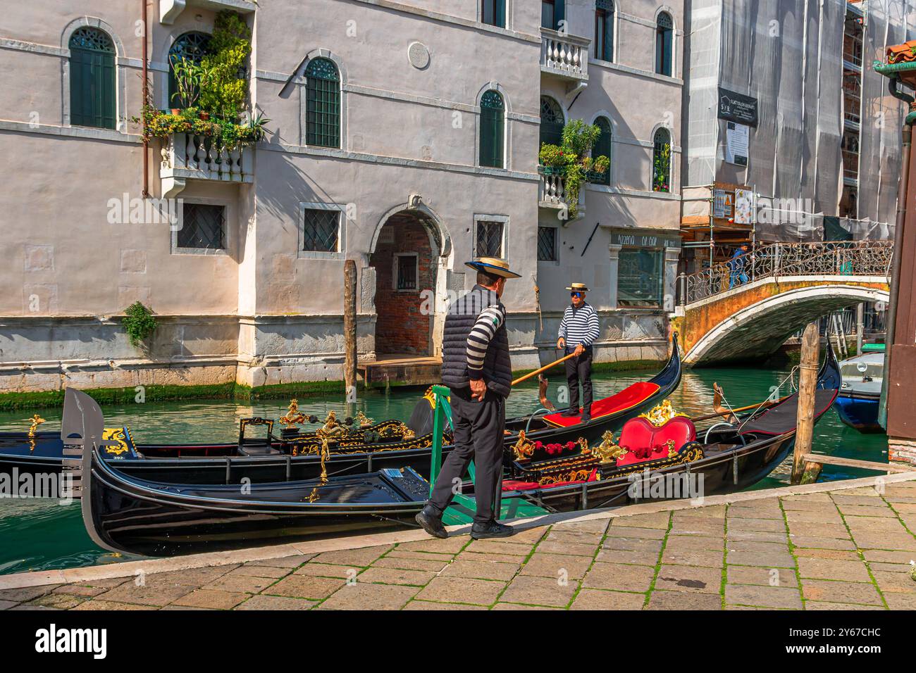 Two Gondoliers and their gondolas at Rio Santa Maria Formosa a canal ...