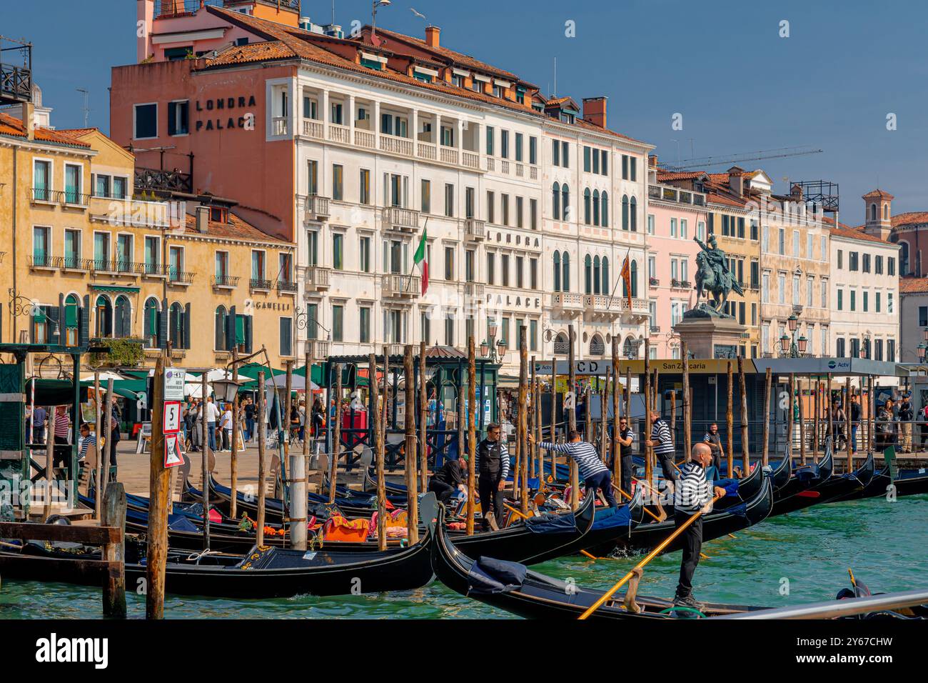 Gondolas and Gondoliers at a Gondola station in front of The Landra ...